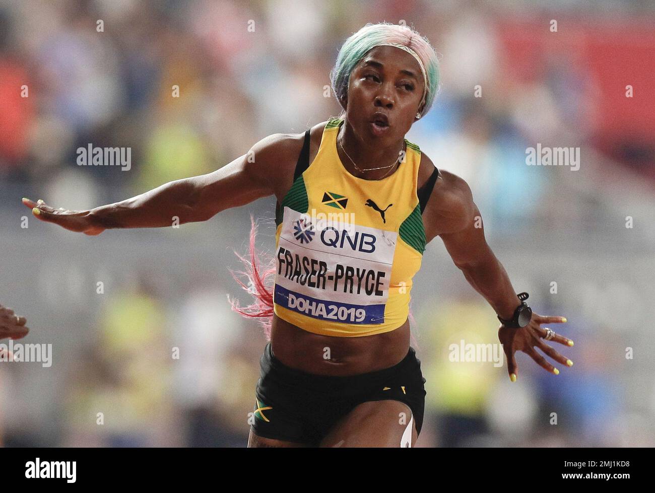 Shelly-Ann Fraser-Pryce, of Jamaica wins the gold medal in the women's 100 meter final ahead of ...