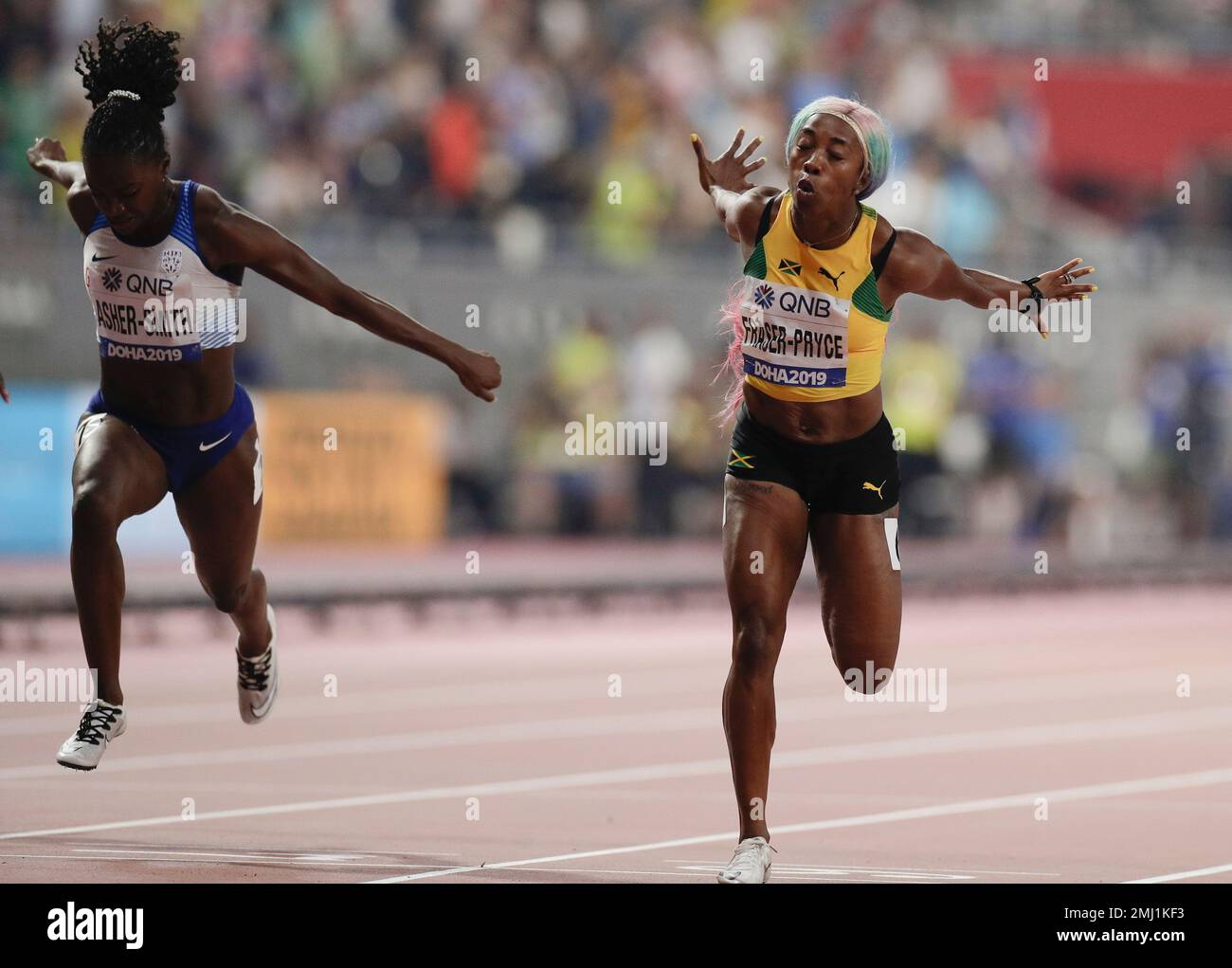 Shelly-Ann Fraser-Pryce, of Jamaica wins the gold medal in the women's 100 meter final ahead of ...