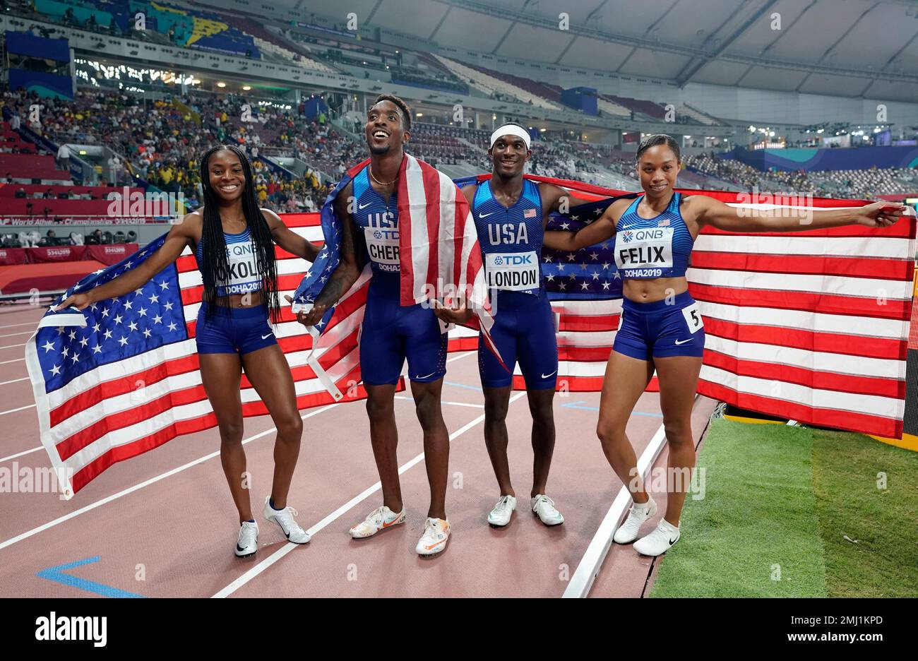 The United States team of Allyson Felix, Wilbert London, Michael Cherry ...
