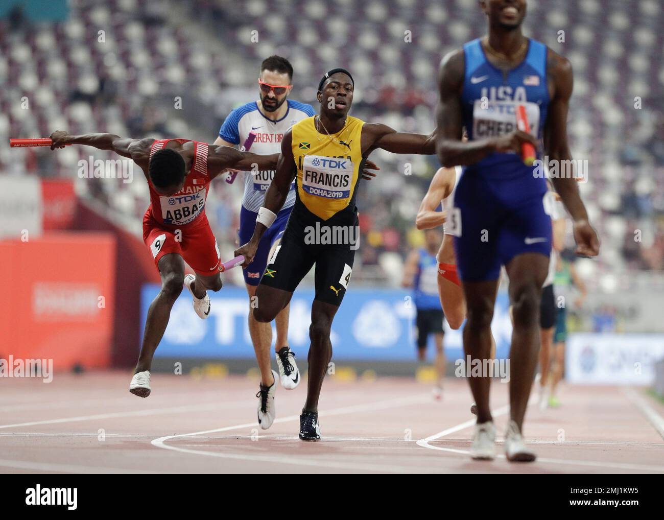 Bahrain's Abbas Abubakar, left, and Jamaica's Javon Francis run the ...