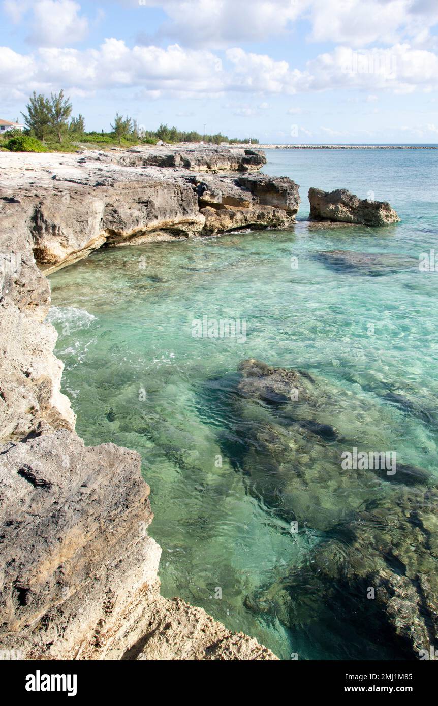 The scenic view of green color waters and eroded rocky coastline on ...