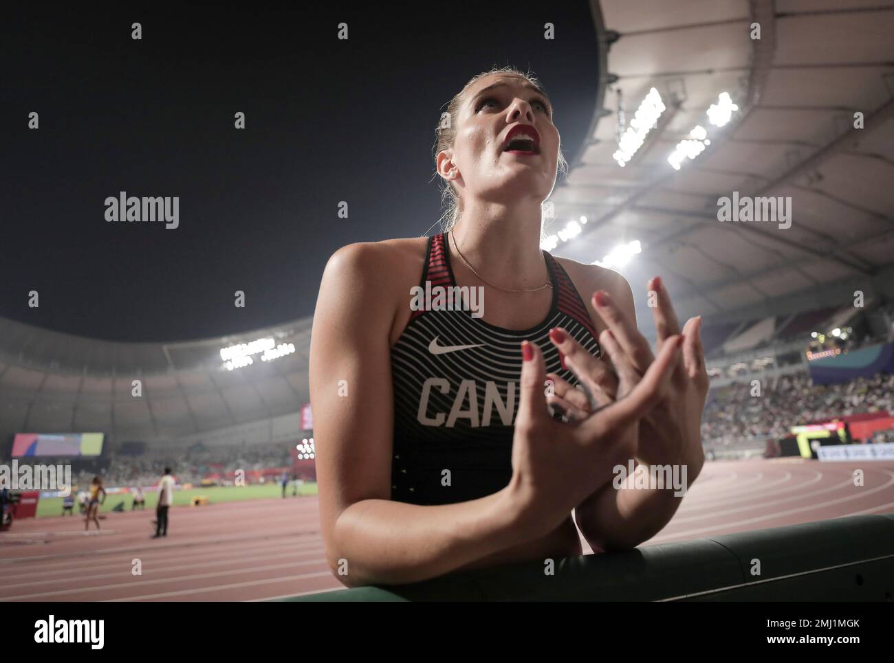 Alysha Newman, of Canada gestures during the women's pole vault final ...
