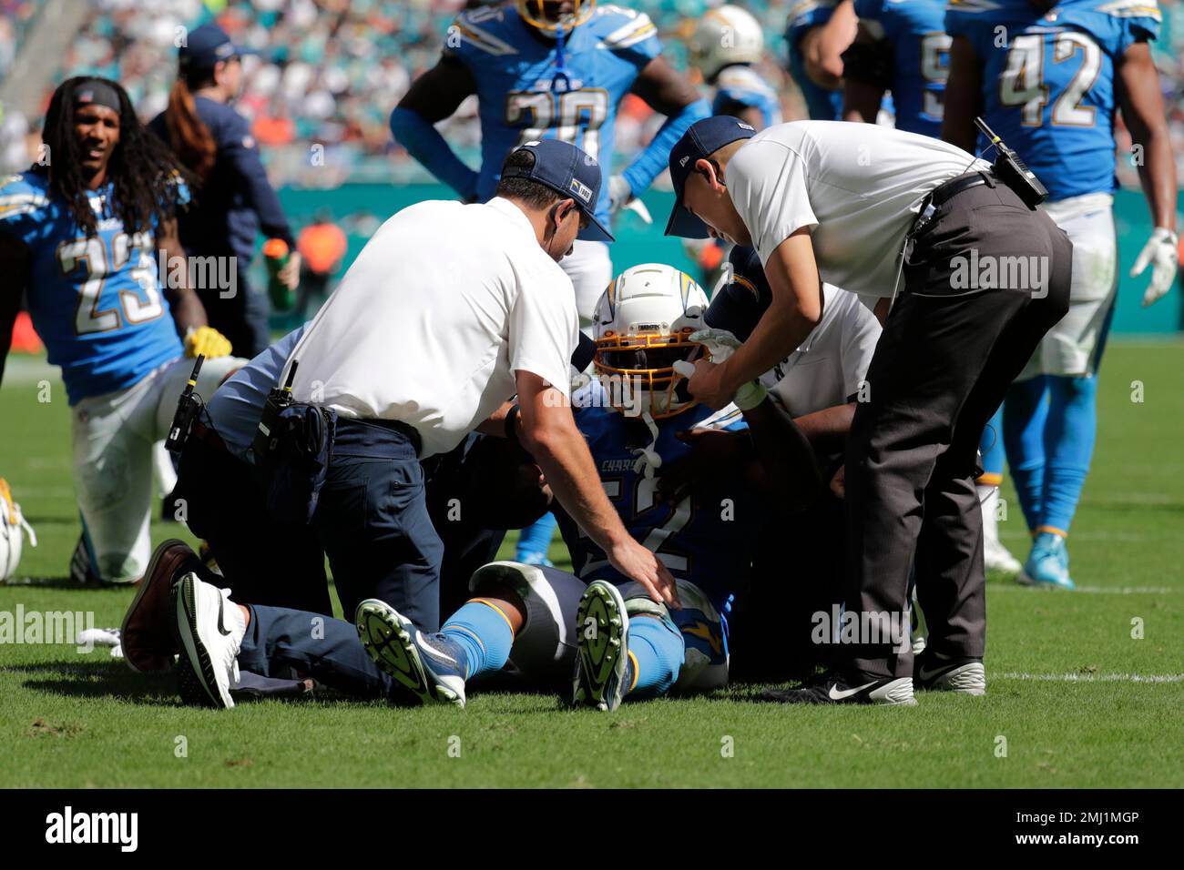 Los Angeles Chargers middle linebacker Denzel Perryman (52) is attended ...