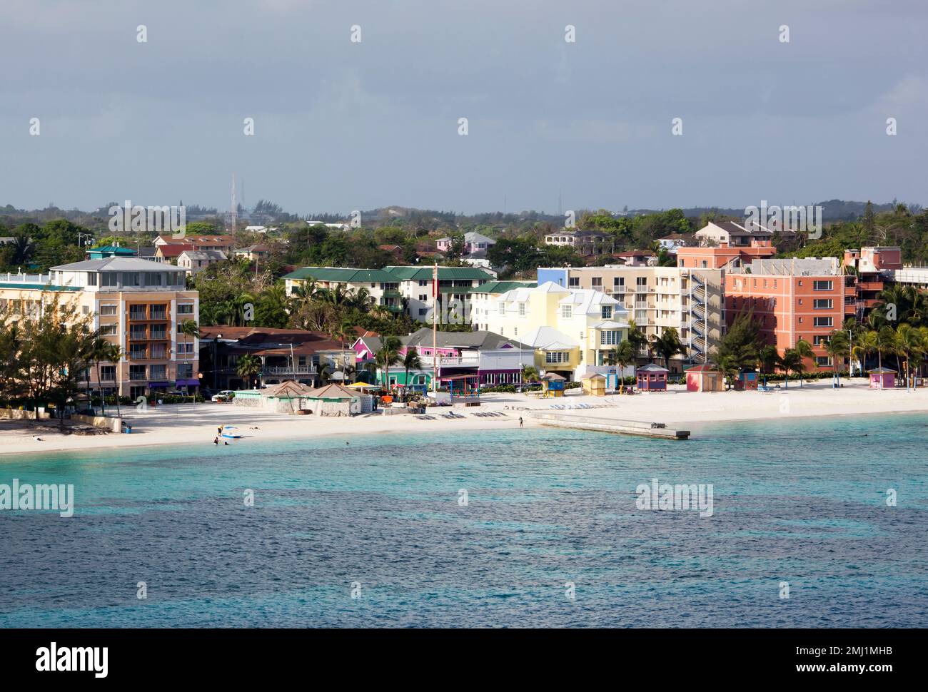 The aerial view of resort hotels and a sandy public beach in Nassau ...