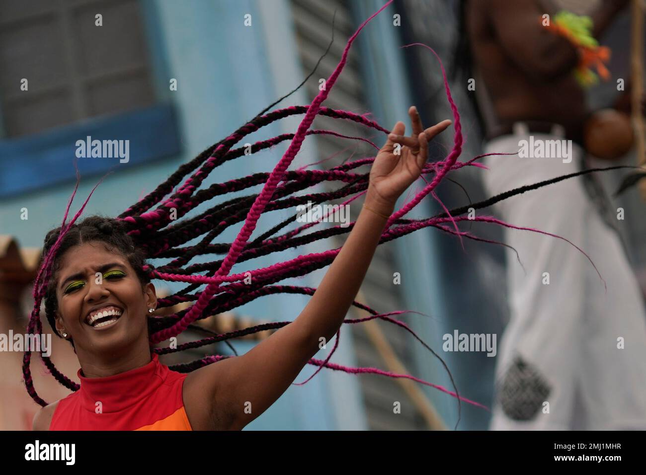An artist of Nos do Morro theater group performs in the favela space at ...