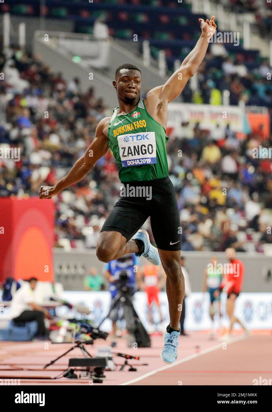 Hugues Fabrice Zango, of Burkina Faso, competes in the triple jump ...