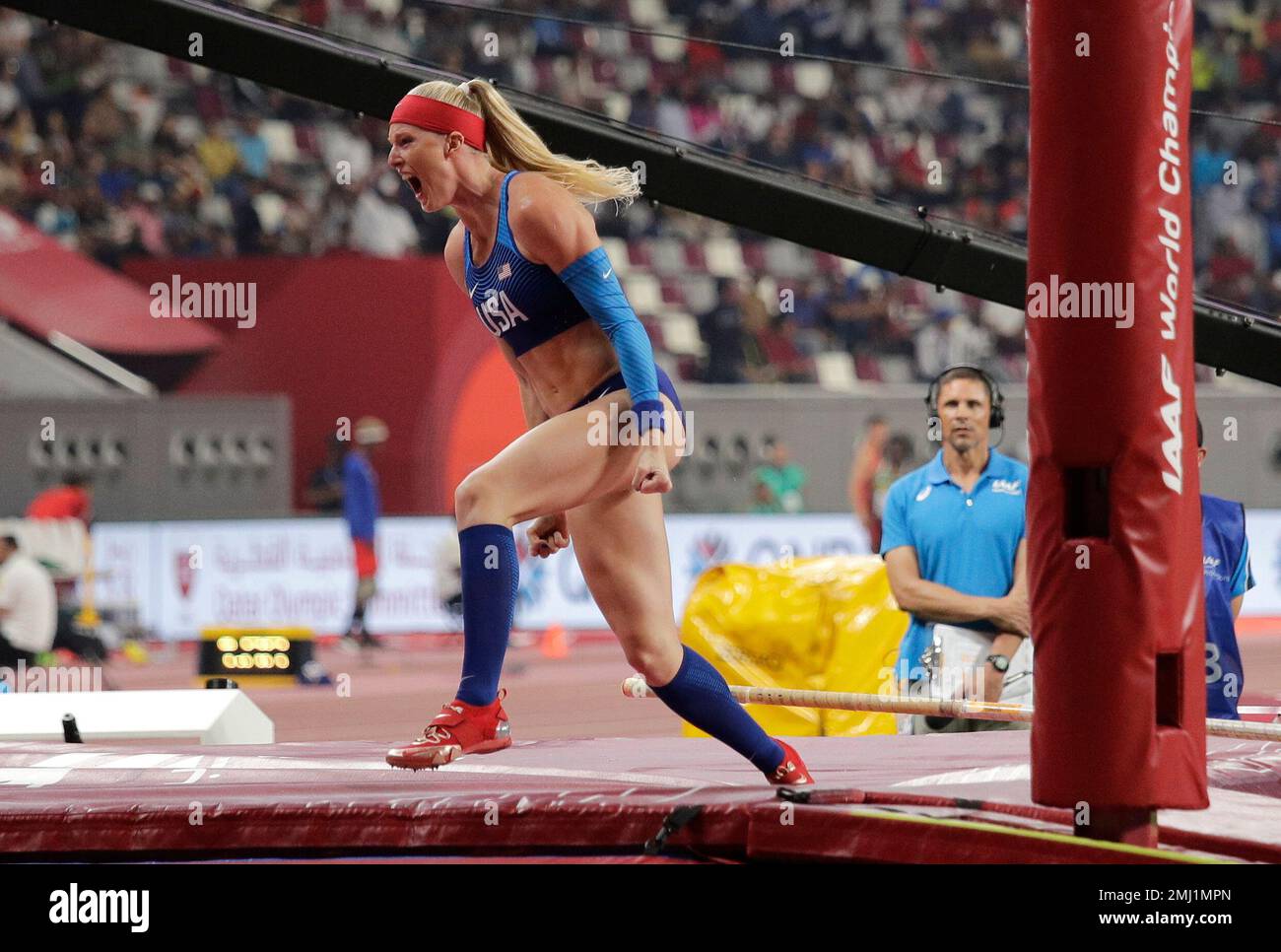 Competitors watch as Sandi Morris, of the United States celebrates a ...