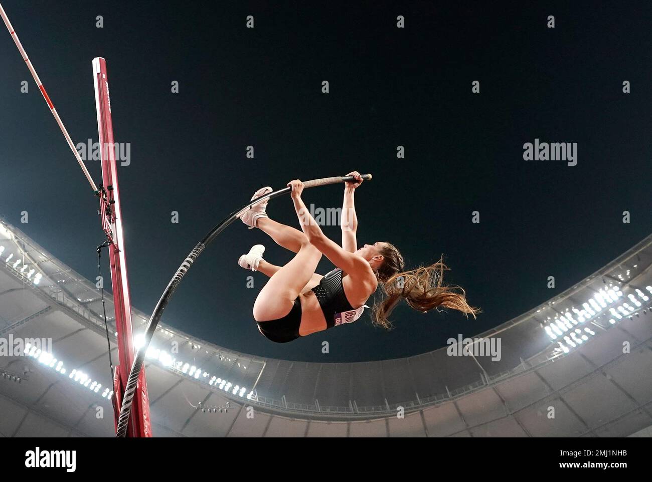 Alysha Newman, of Canada, competes in the women's pole vault final at ...