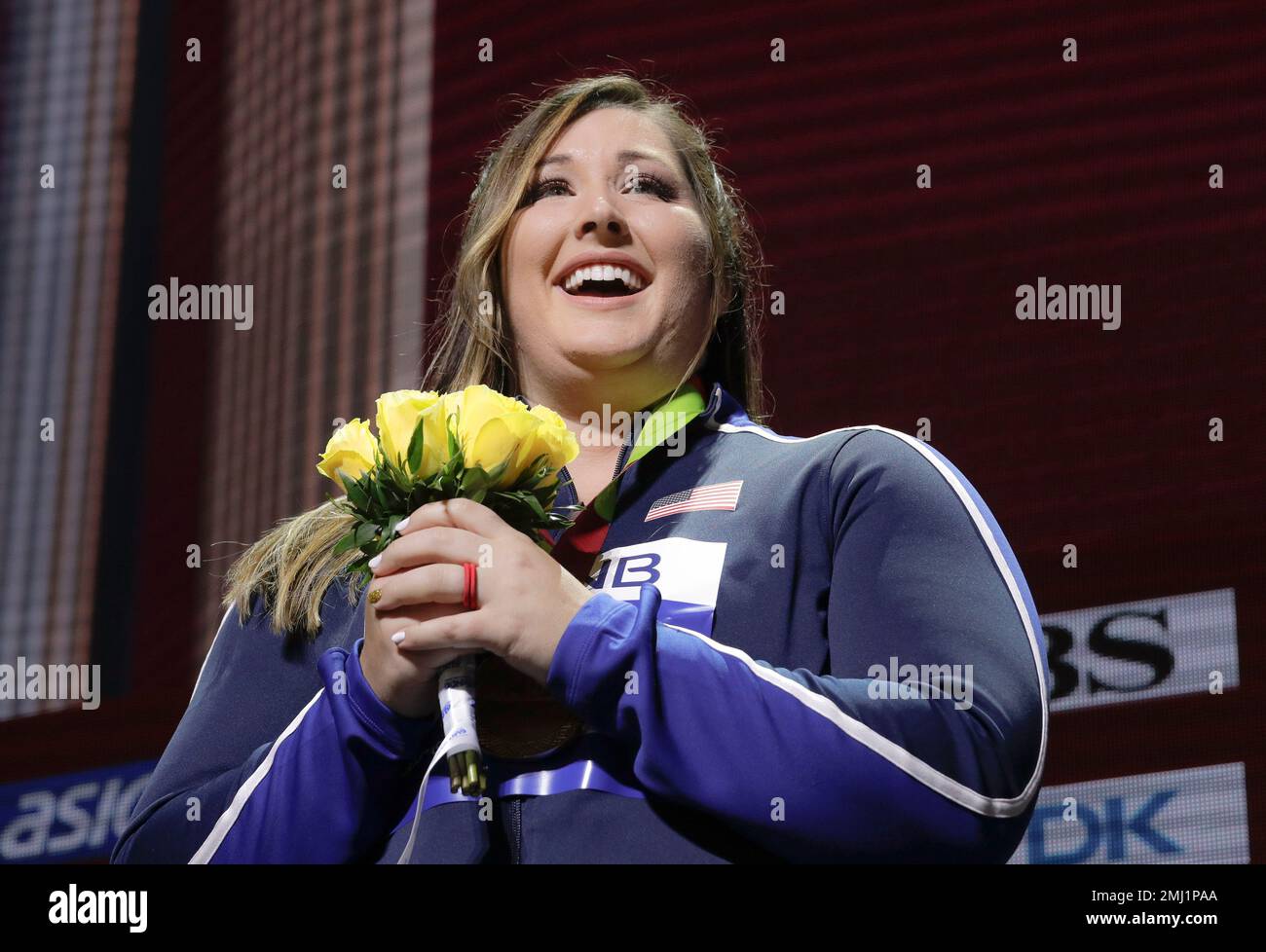 Deanna Price, of the United States, gold winner, smiles during the ...