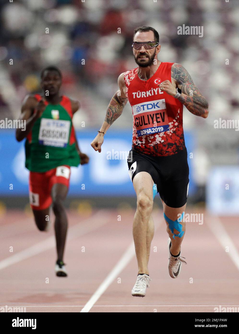 Ramil Guliyev, of Turkey competes in the men's 200 meter heats at the ...