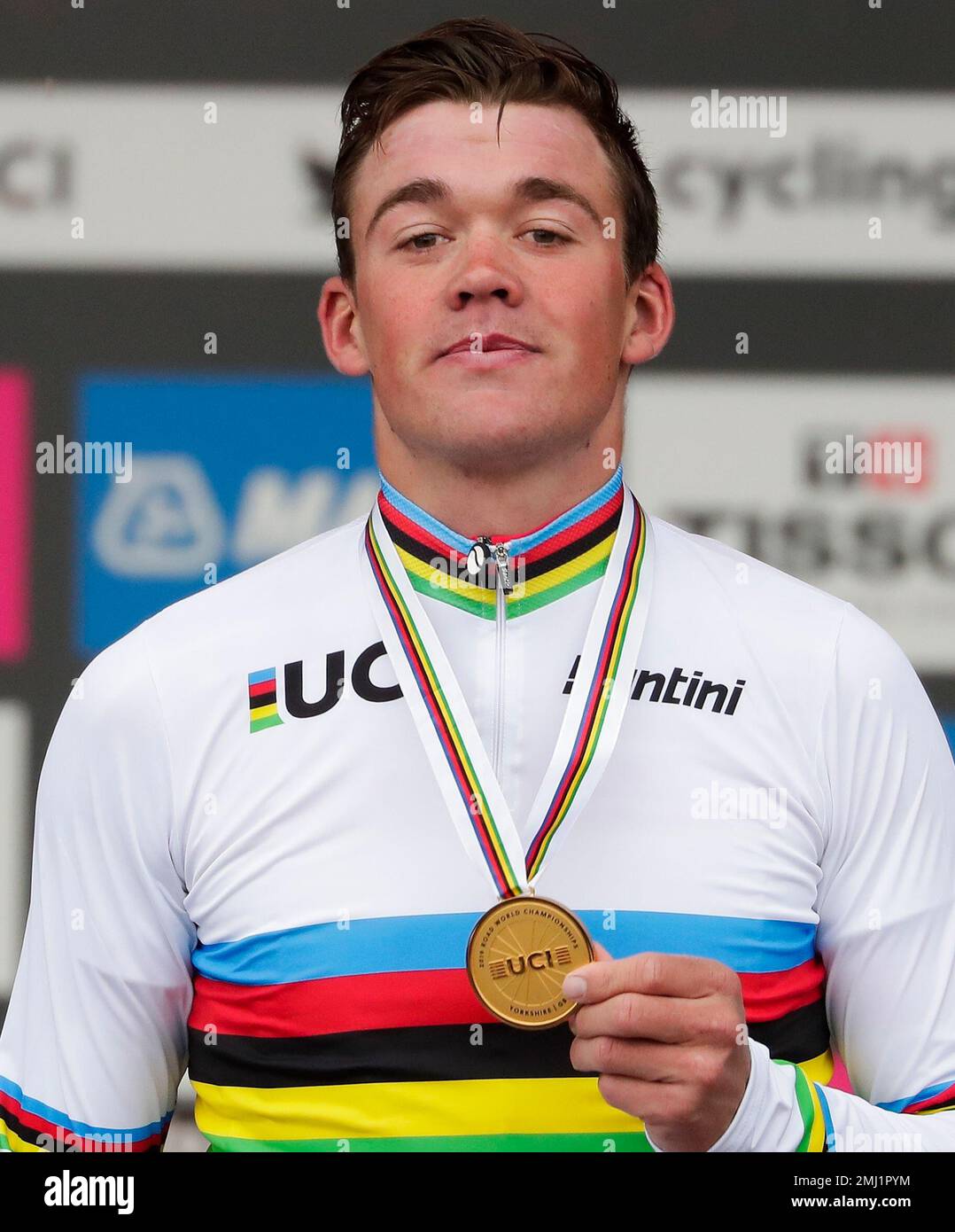 Denmark's Mads Pedersen poses on the podium after winning the men elite ...