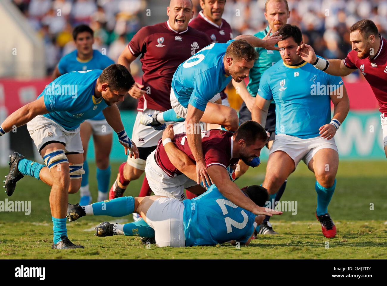 Georgia's Merab Sharikadze, center and Uruguay's Agustín Ormaechea ...