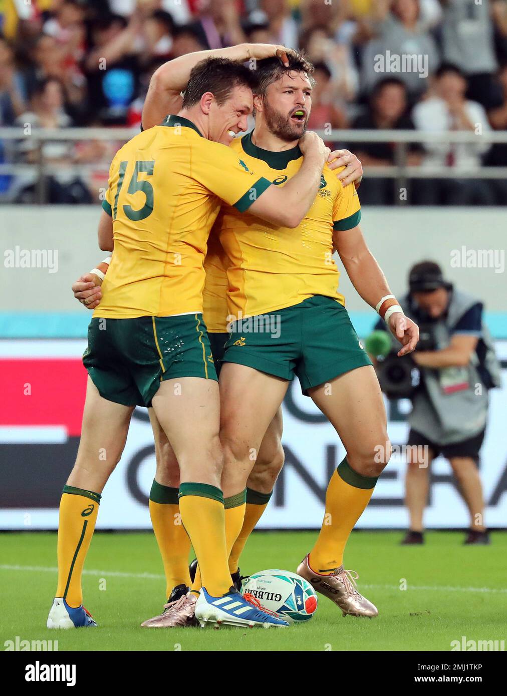 Australia's Adam Ashley-Cooper, right, celebrates after scoring a try ...