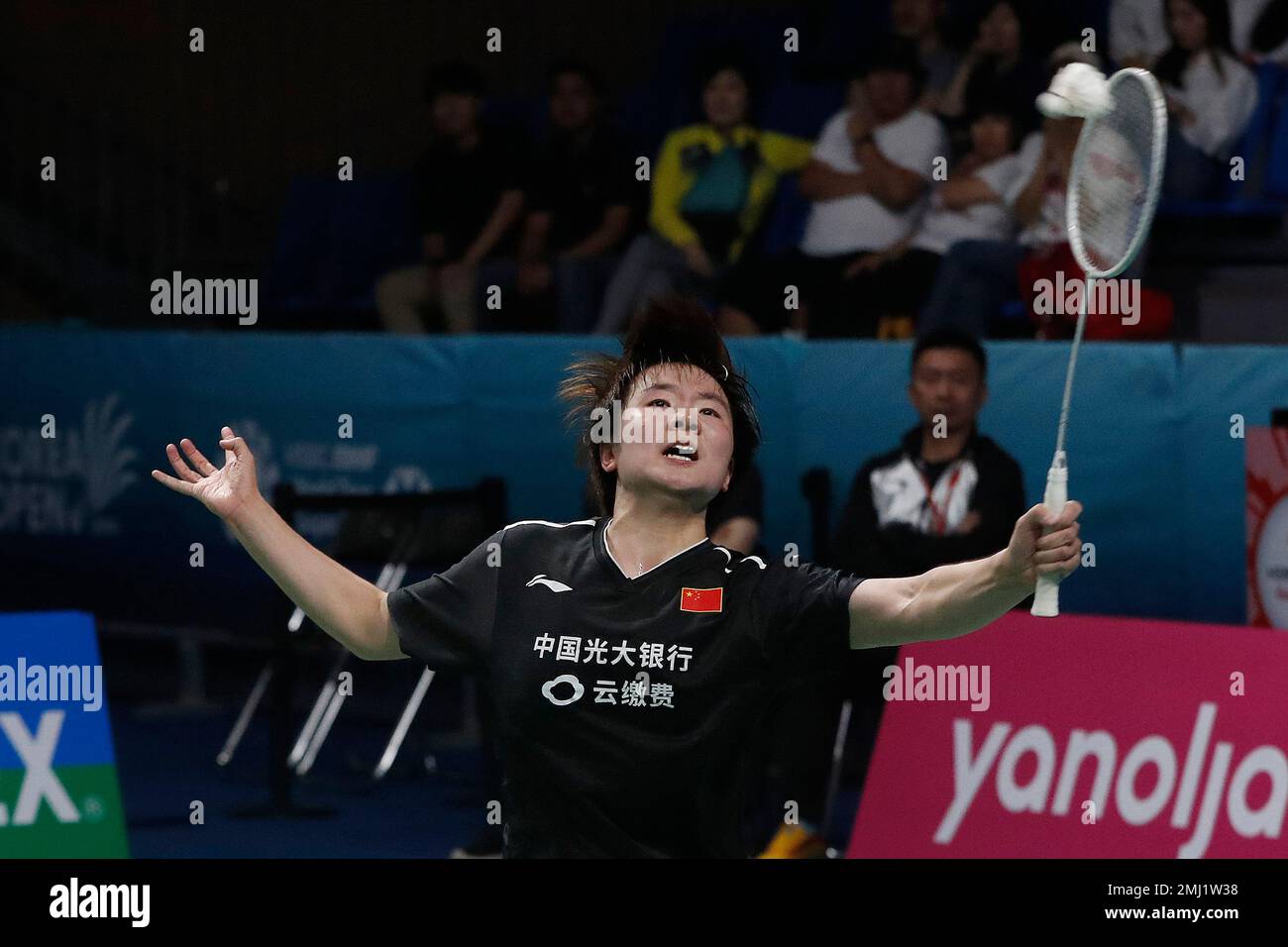 China's He Bing Jiao returns a shot during women's single final match ...