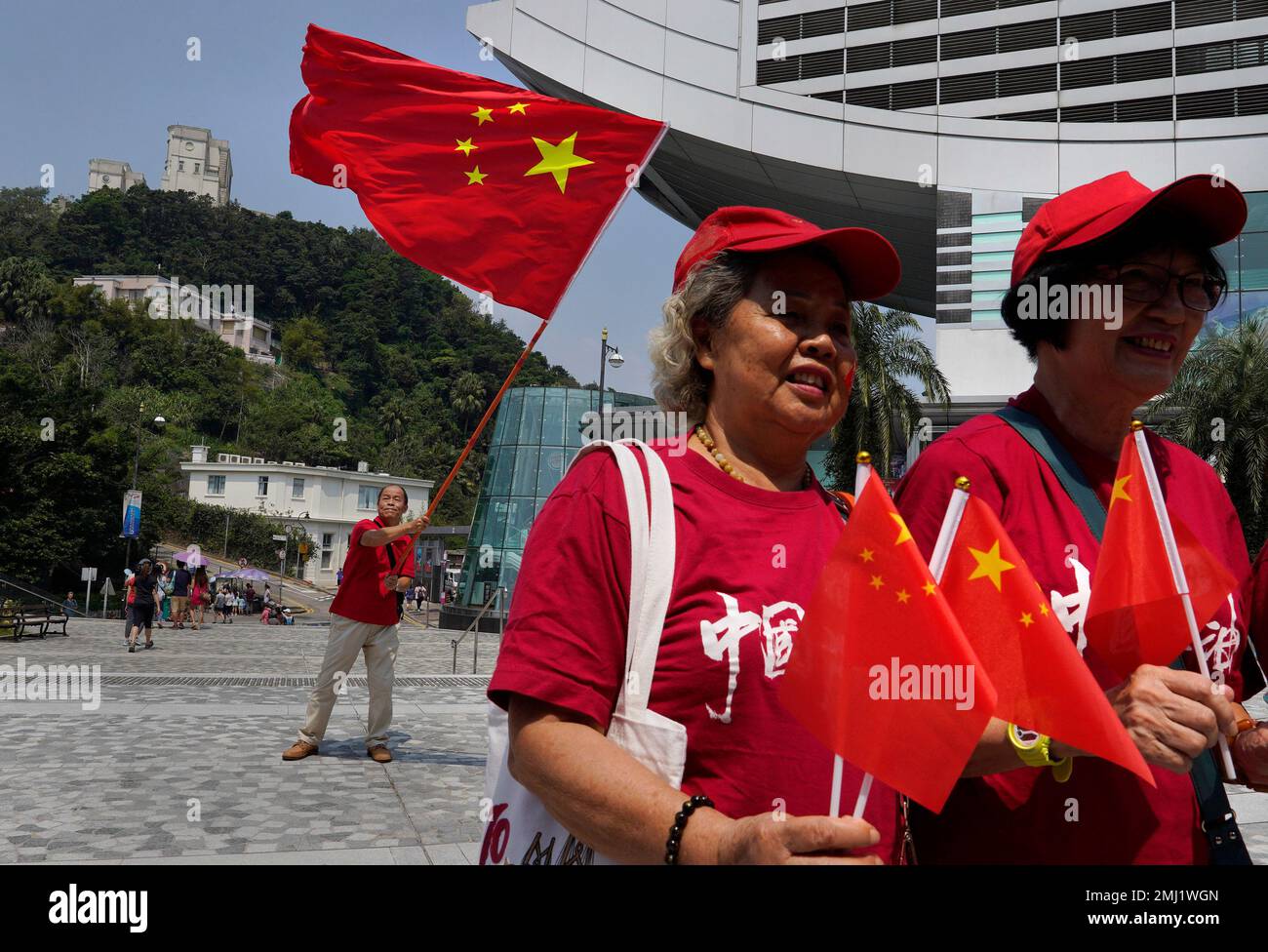 Pro-China supporters wave Chinese national flag at the Peak in Hong ...