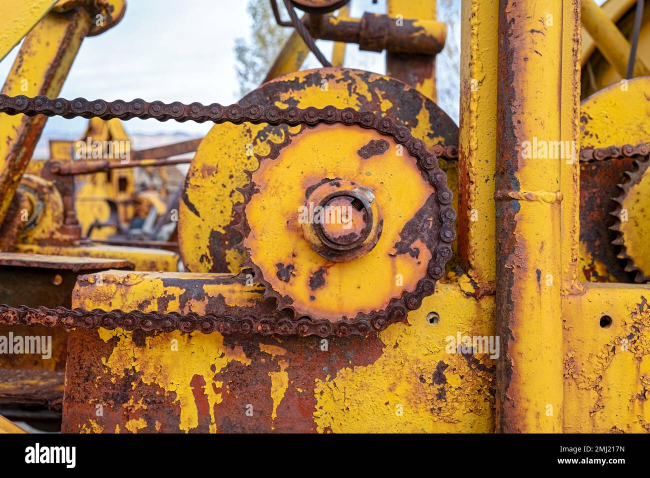 Corroded chain on a rusty gear wheel of an antique machine Stock Photo ...