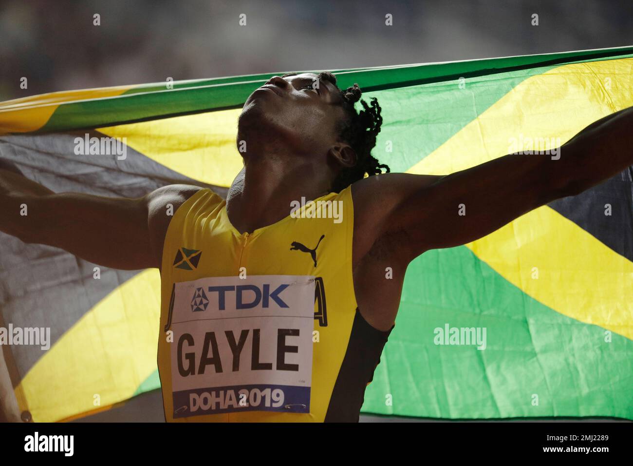 Tajay Gayle of Jamaica celebrates after winning the gold medal in the ...