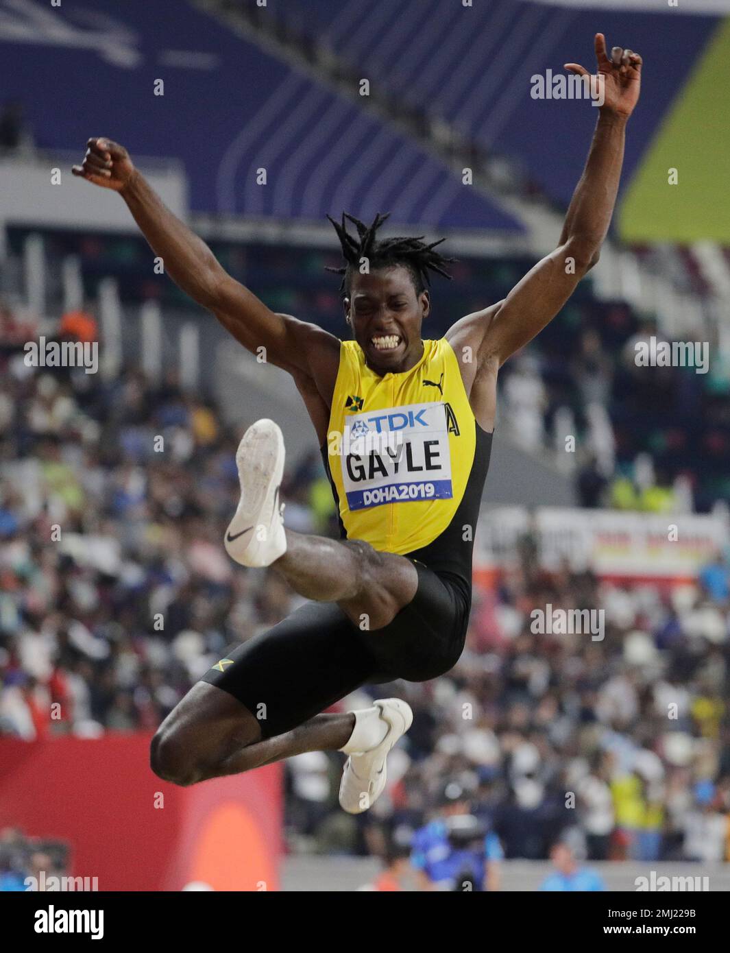 Tajay Gayle, of Jamaica, competes in the men's long jump final at the ...