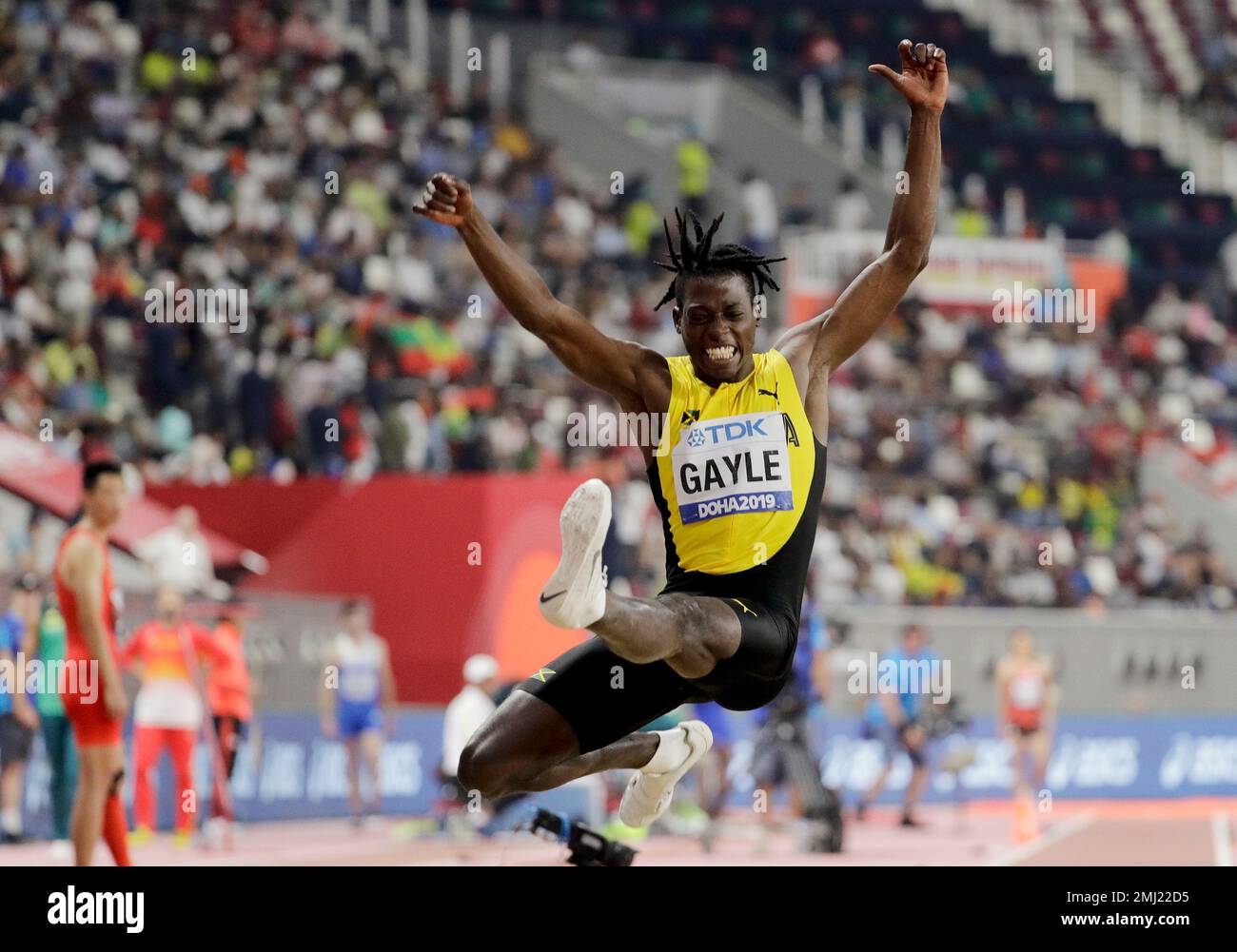 Tajay Gayle, of Jamaica, competes in the men's long jump final at the ...