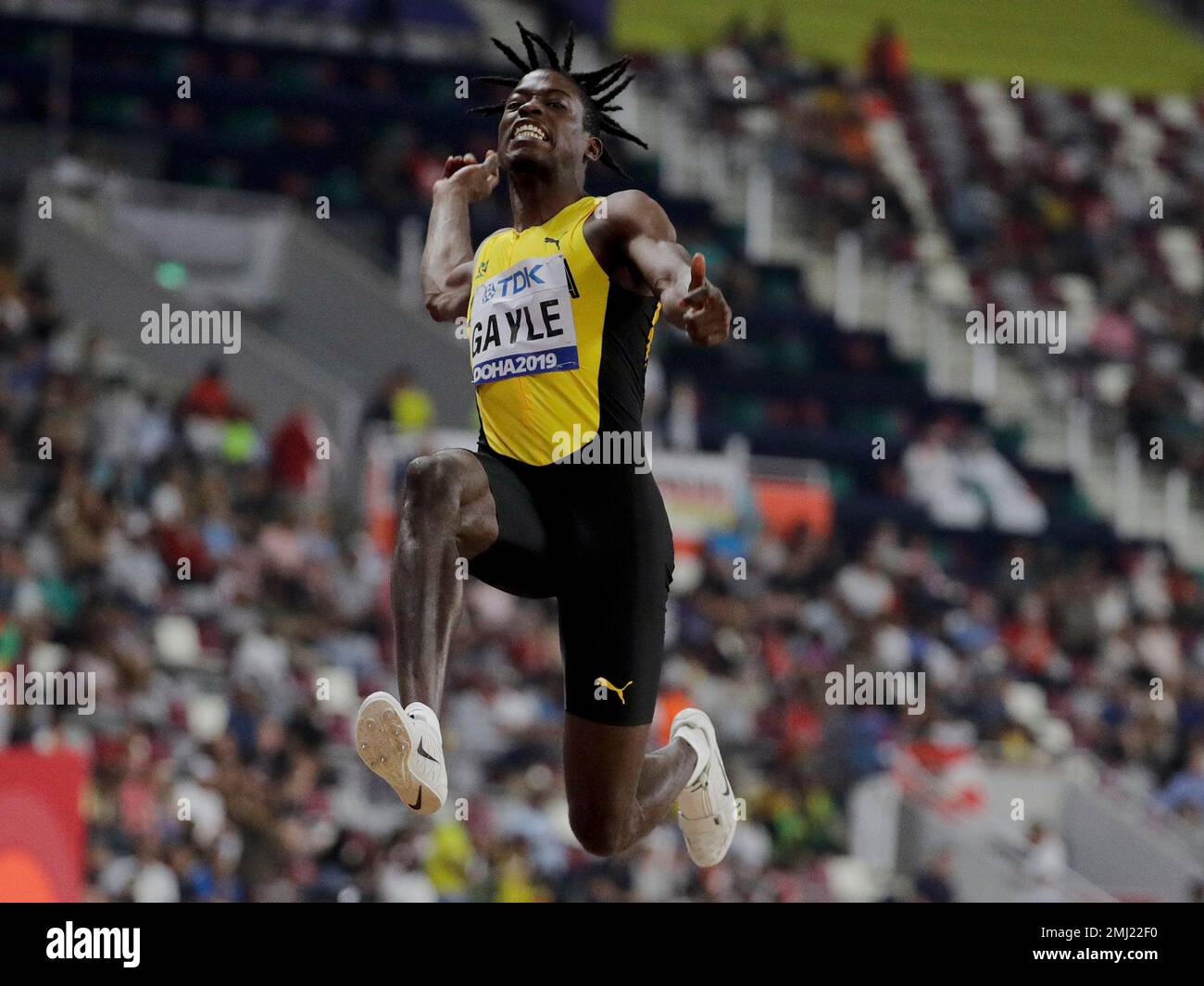 Tajay Gayle, of Jamaica, competes in the men's long jump final at the ...