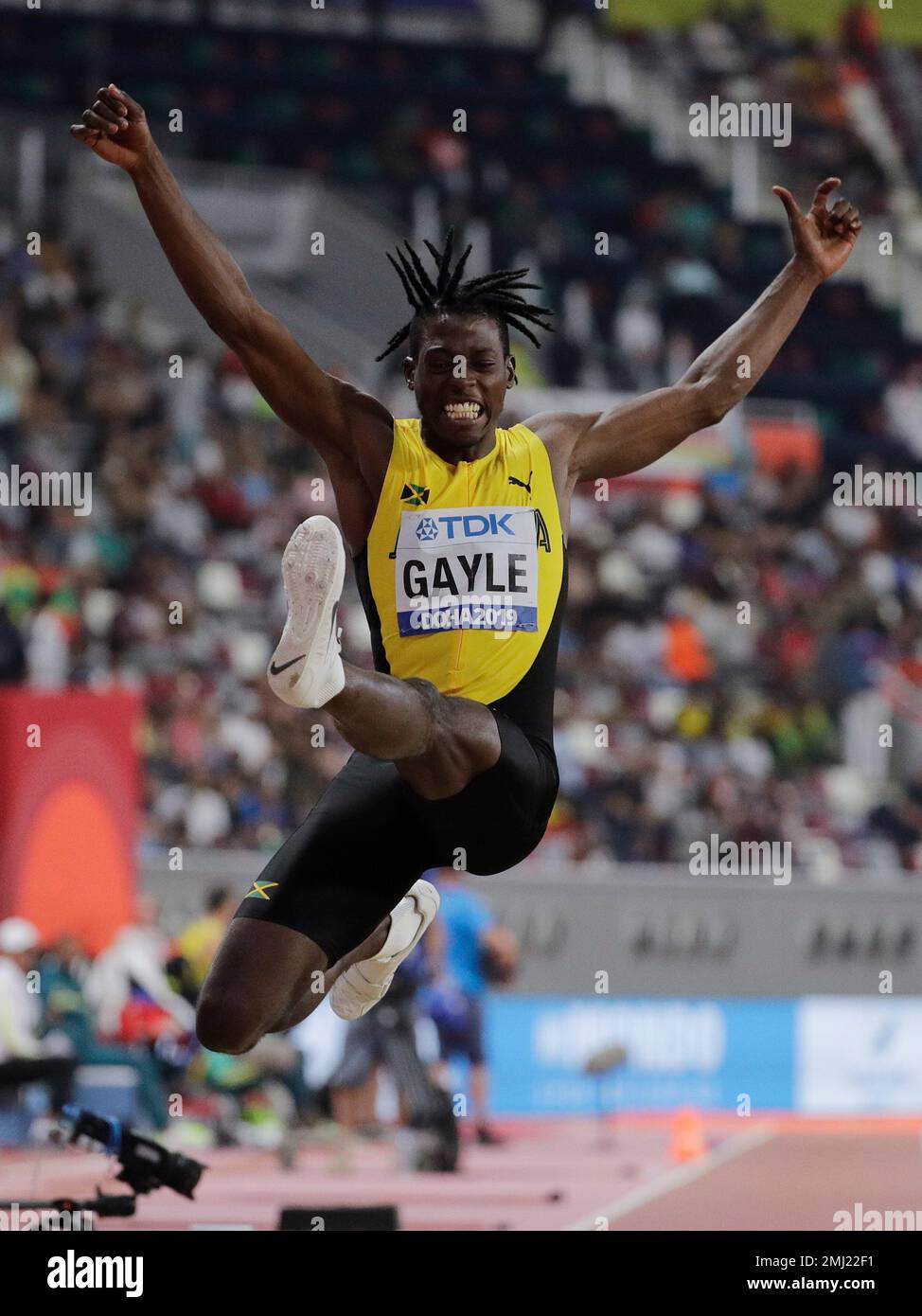 Tajay Gayle, of Jamaica, competes in the men's long jump final at the ...