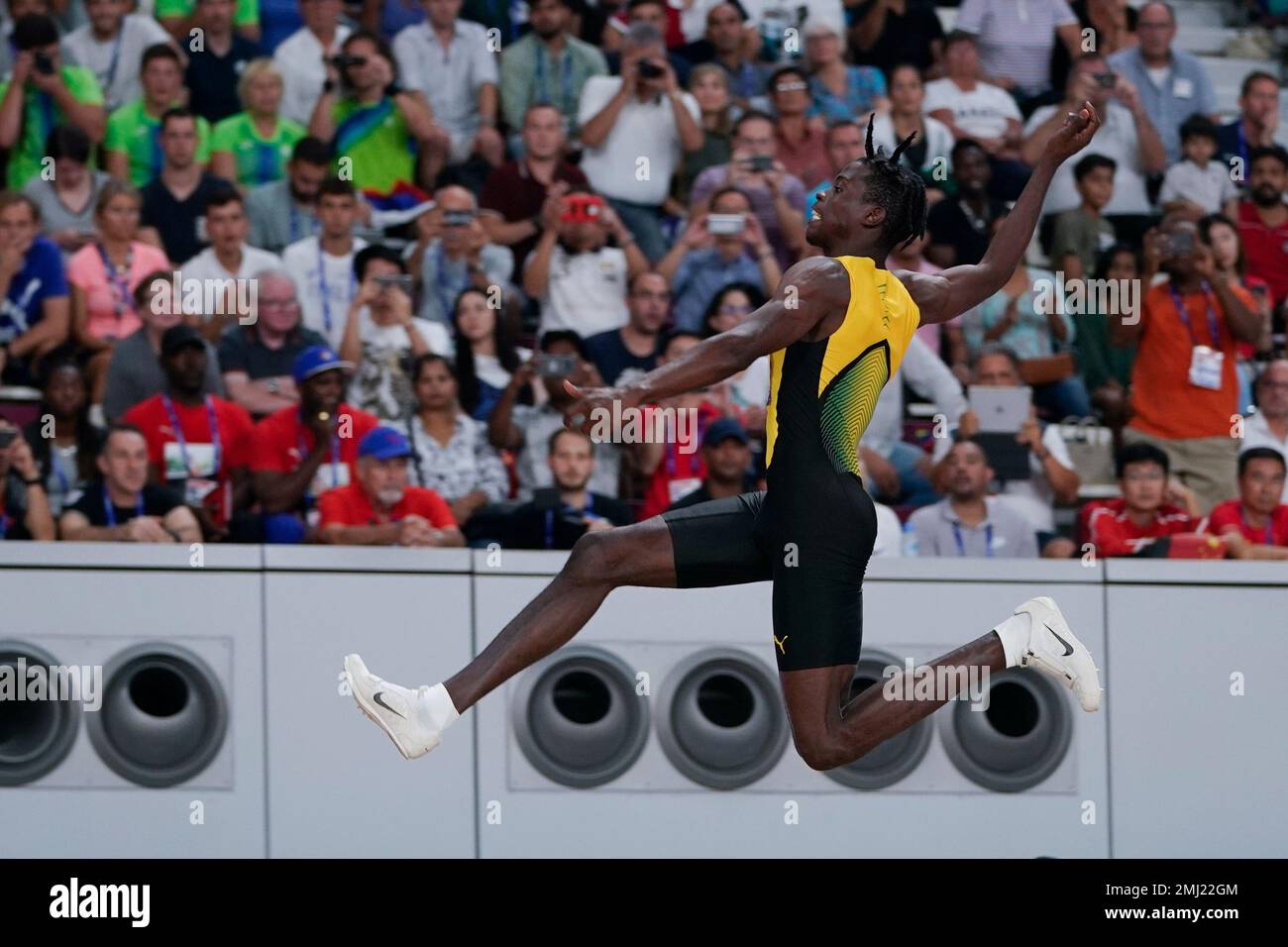 Tajay Gayle, of Jamaica, competes in the men's long jump final at the ...