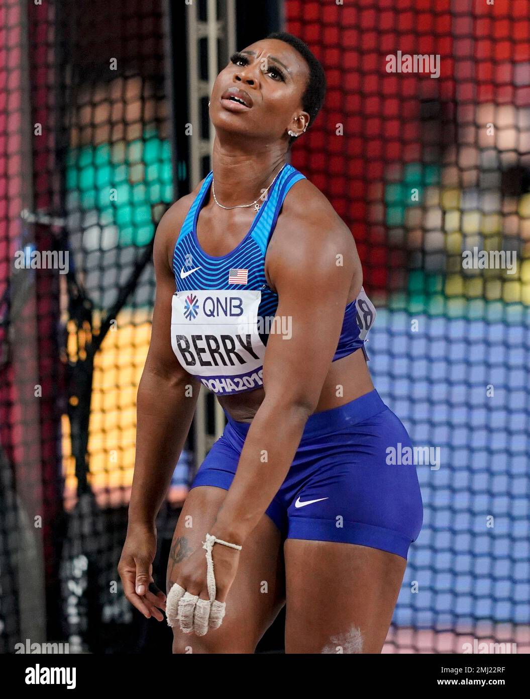 Gwen Berry, of the United States, looks up during in the women's hammer ...