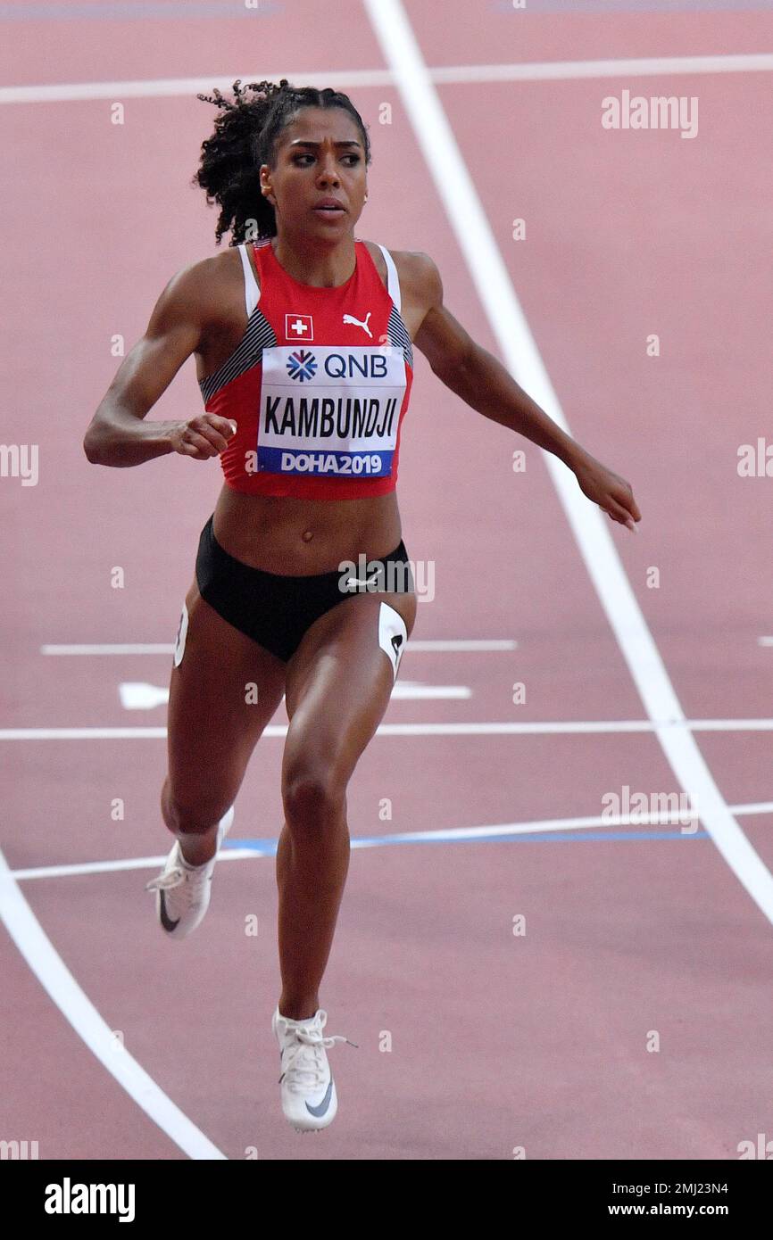 Mujinga Kambundji, of Switzerland, competes in a women's 100 meter race ...