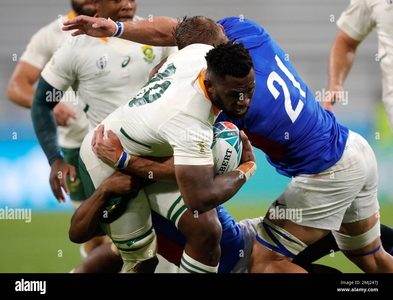 South Africa's Siya Kolisi is tackled by Namibia's Wian Conradie during ...