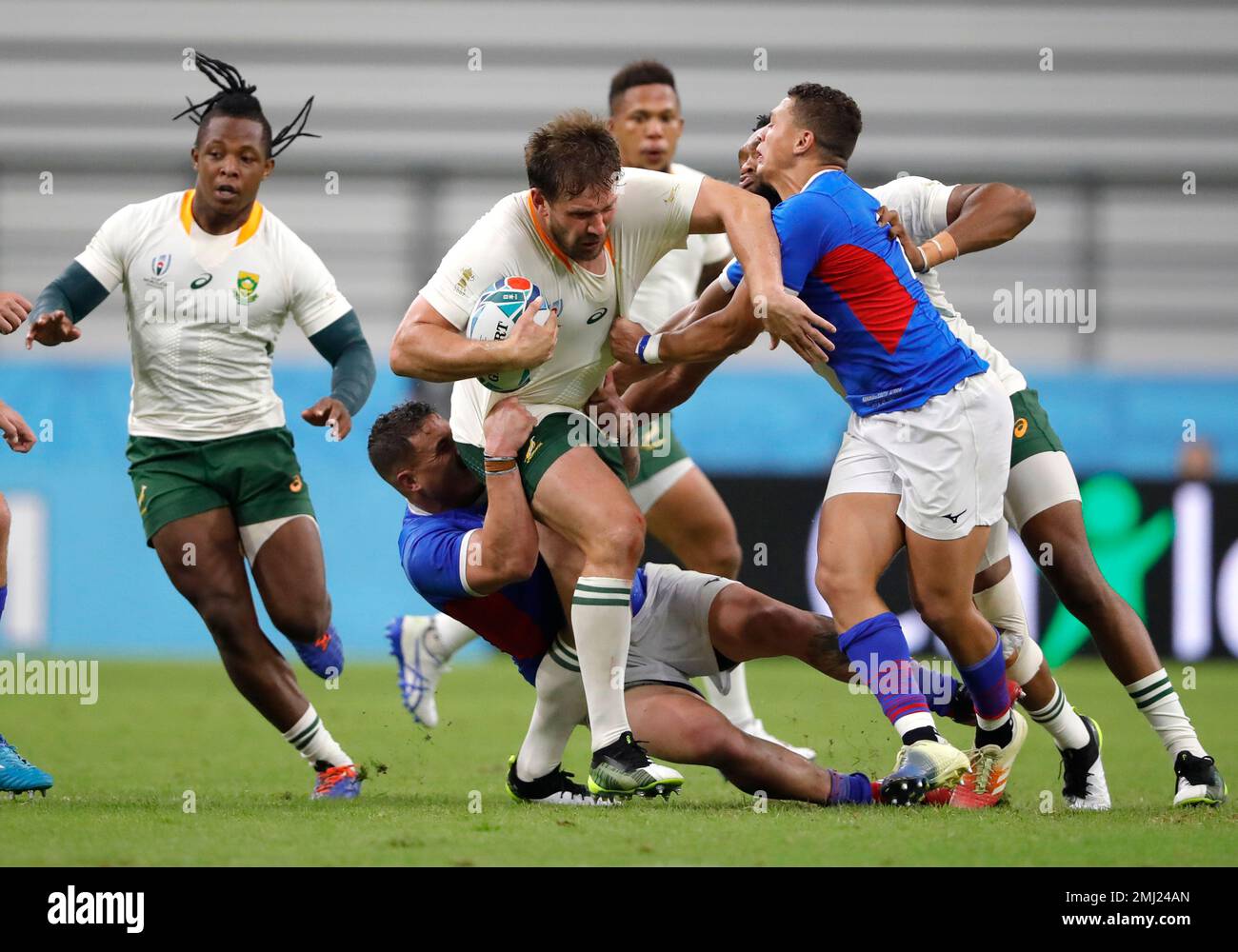 South Africa's Frans Steyn runs at the Namibian defence during the ...