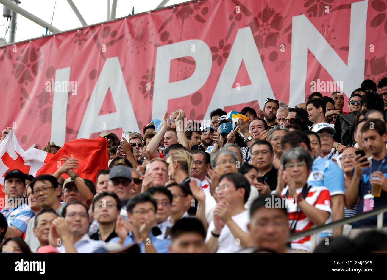 Spectators watch the Rugby World Cup Pool C game at Hanazono Rugby ...