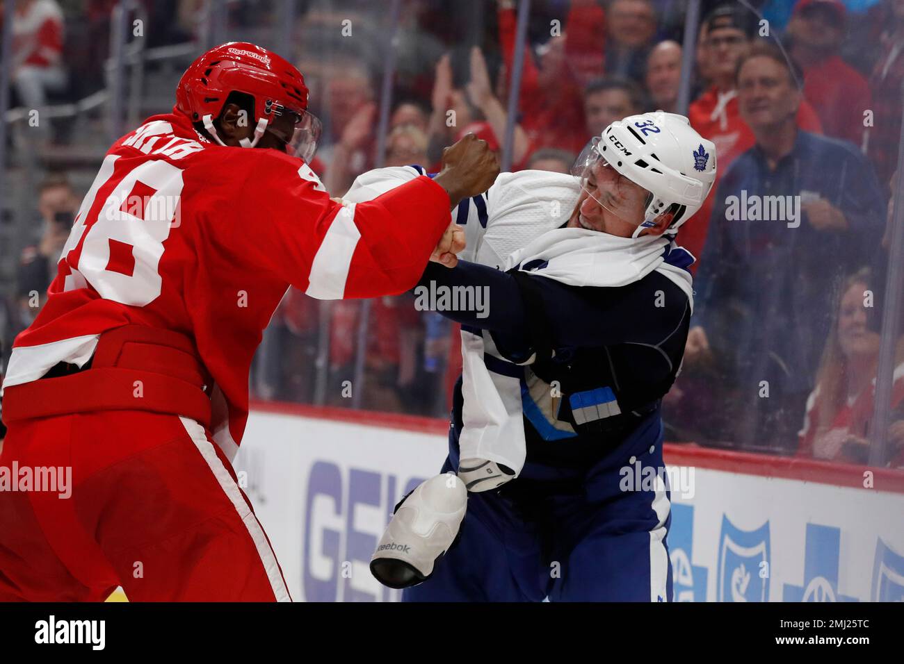 Detroit Red Wings left wing Givani Smith (48) and Toronto Maple Leafs ...