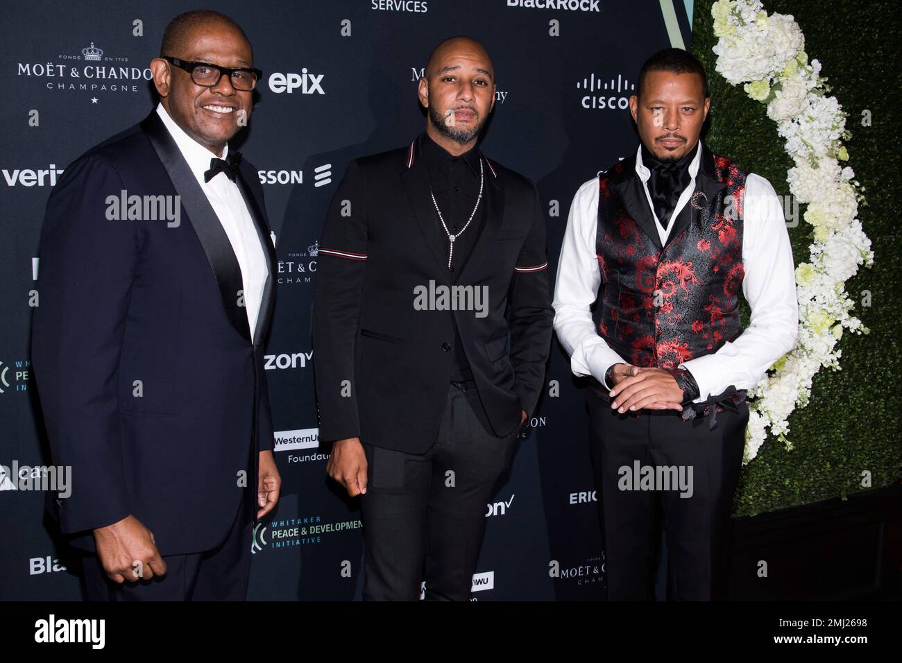 Forest Whitaker, from left, Swizz Beatz and Terrence Howard attend the ...