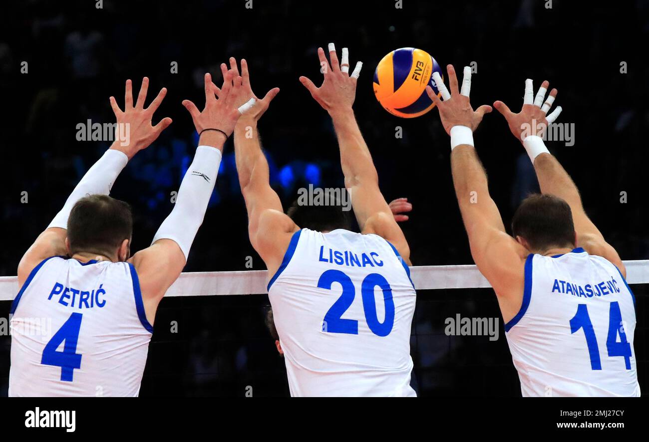 Serbia's Nemanja Petricmen, Srecko Lisinac and Aleksandar Atanasijevic go up to block against ...