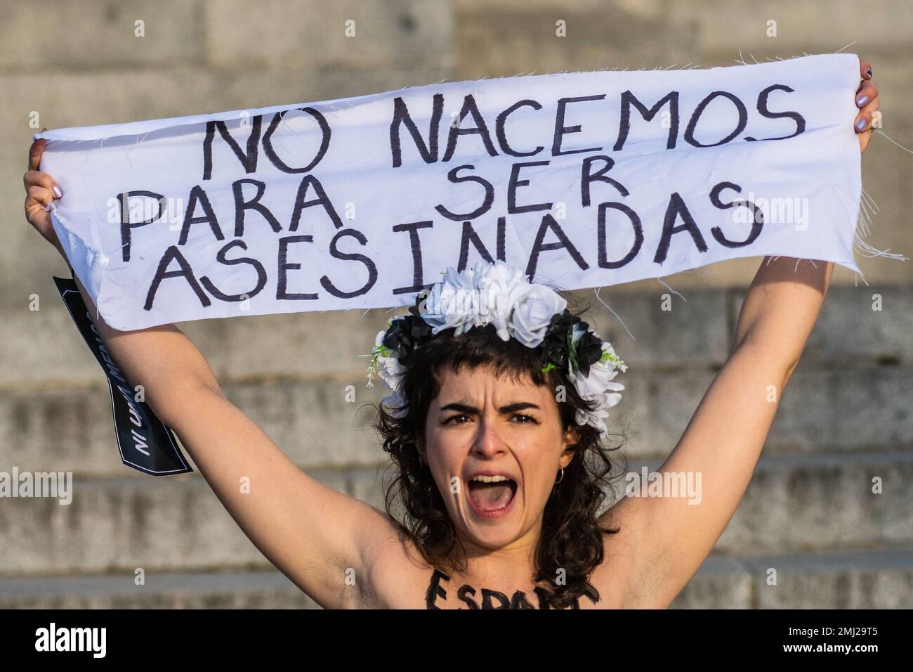 Madrid, Spain. 27th Jan, 2023. Activist of feminist group FEMEN holds a ...