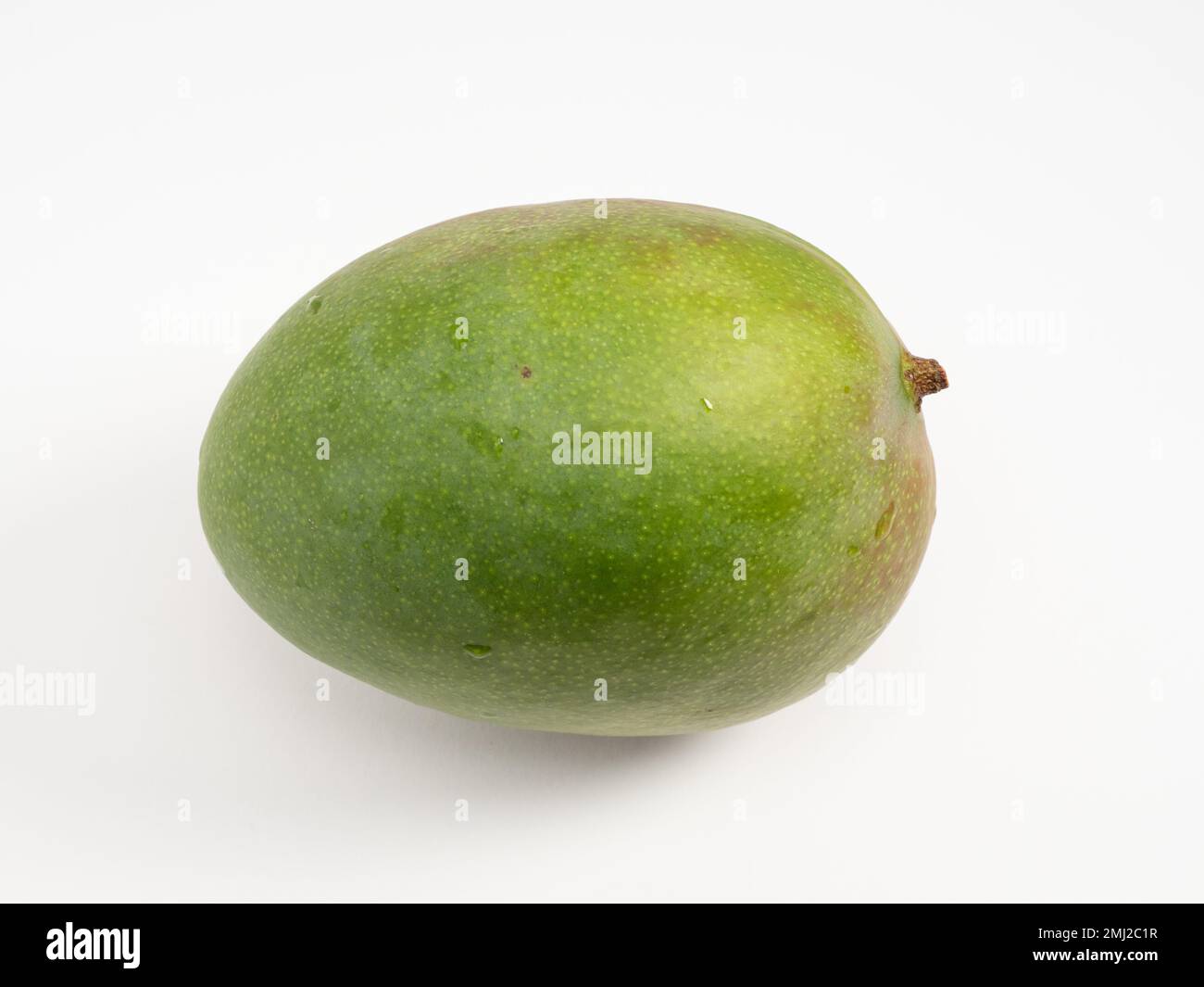 Ripe mango on a white background. Fresh mango. Close-up Stock Photo - Alamy