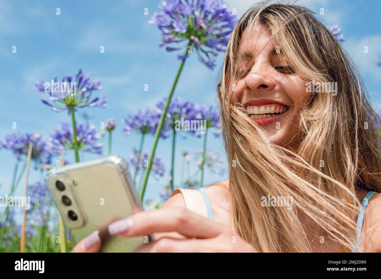 closeup of young latin woman of colombian ethnicity with long hair ...