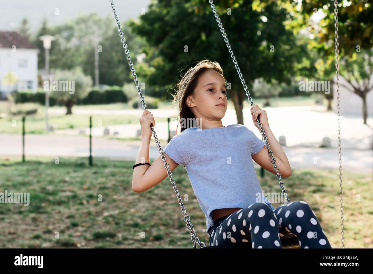 Child sad playground hi-res stock photography and images - Alamy
