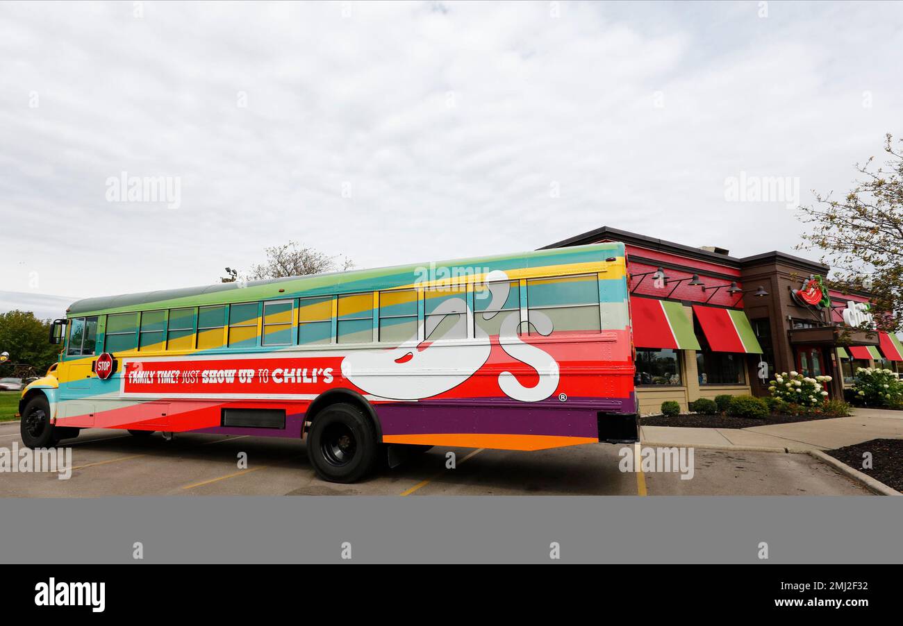 IMAGE DISTRIBUTED FOR CHILLI'S- Chili's custom school bus at Chili's ...