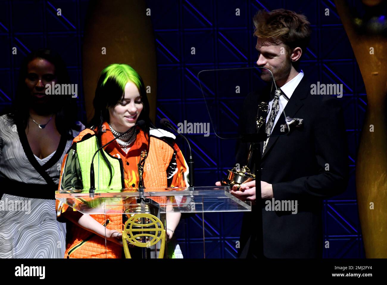 Billie Eilish and Finneas O'Connell accept a Clio Music Award on stage ...