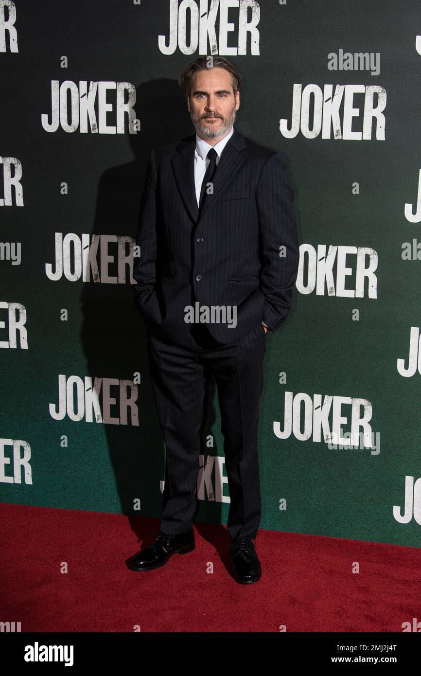 Actor Joaquin Phoenix poses for photographers upon arrival at the UK ...