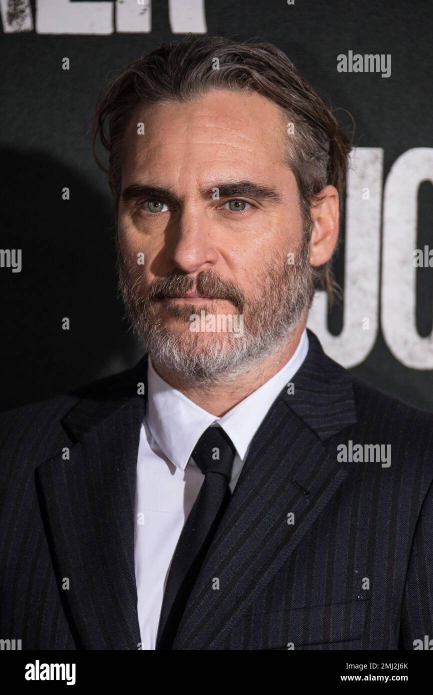 Actor Joaquin Phoenix poses for photographers upon arrival at the UK ...
