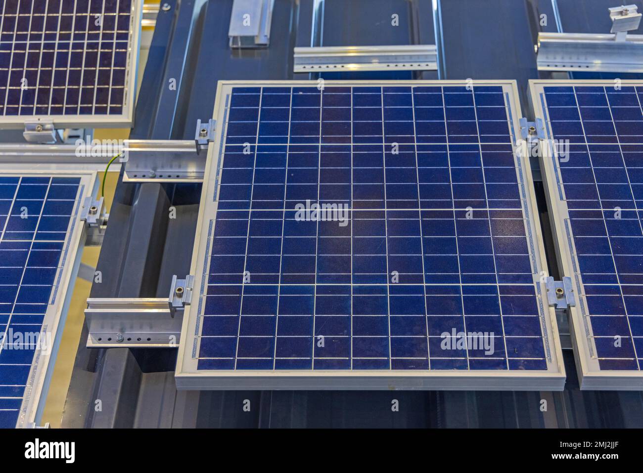 Mounting Solar Panels With Aluminium Railing at Metal Roof Stock Photo ...