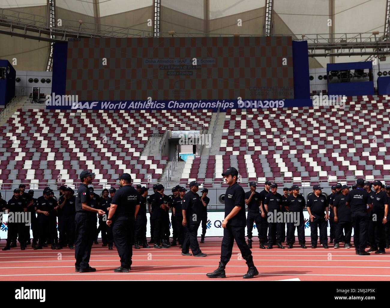 Security guards wait for assignments inside the Khalifa International ...