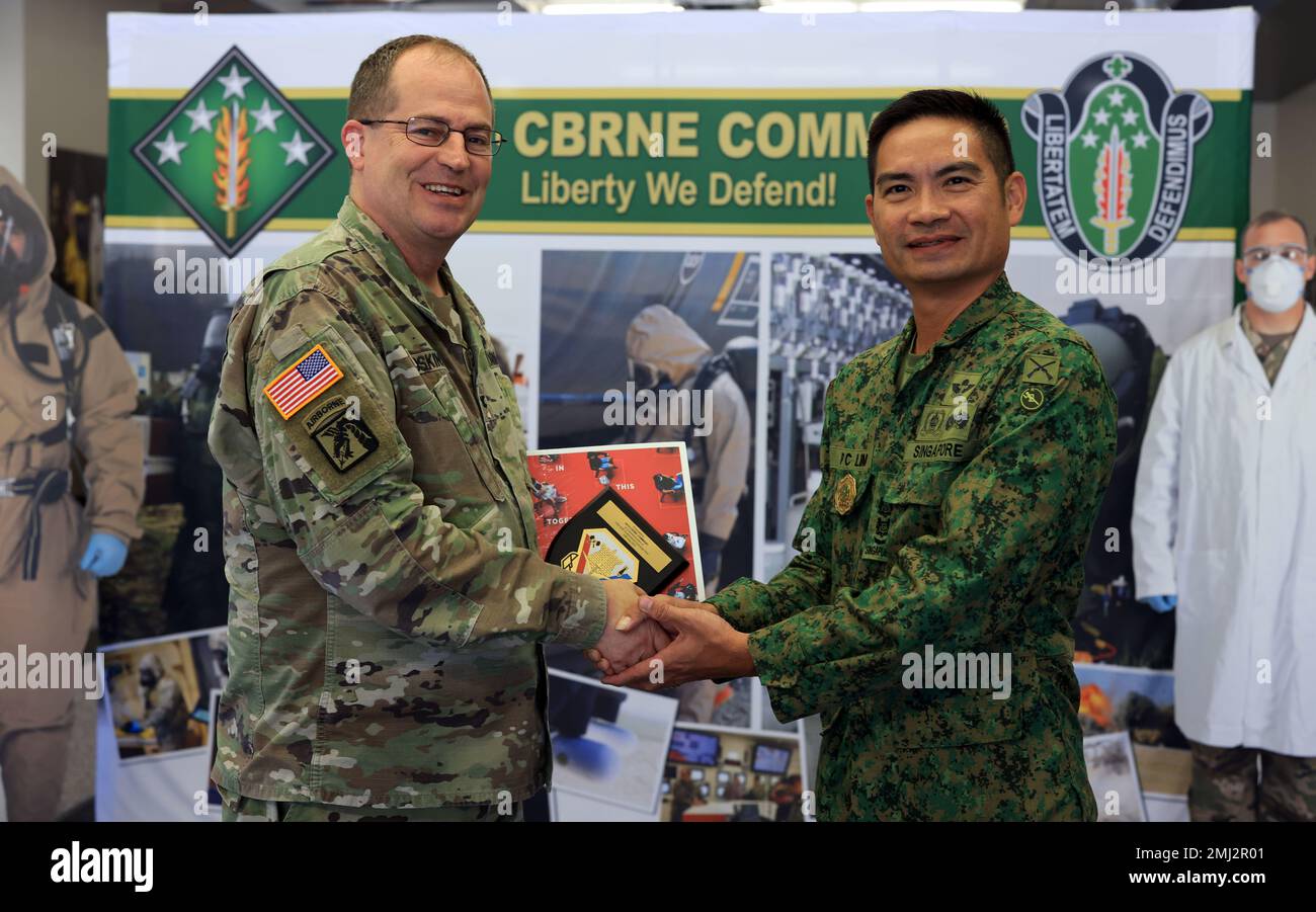 Col. Brant D. Hoskins (left), the deputy commanding officer of the 20th ...