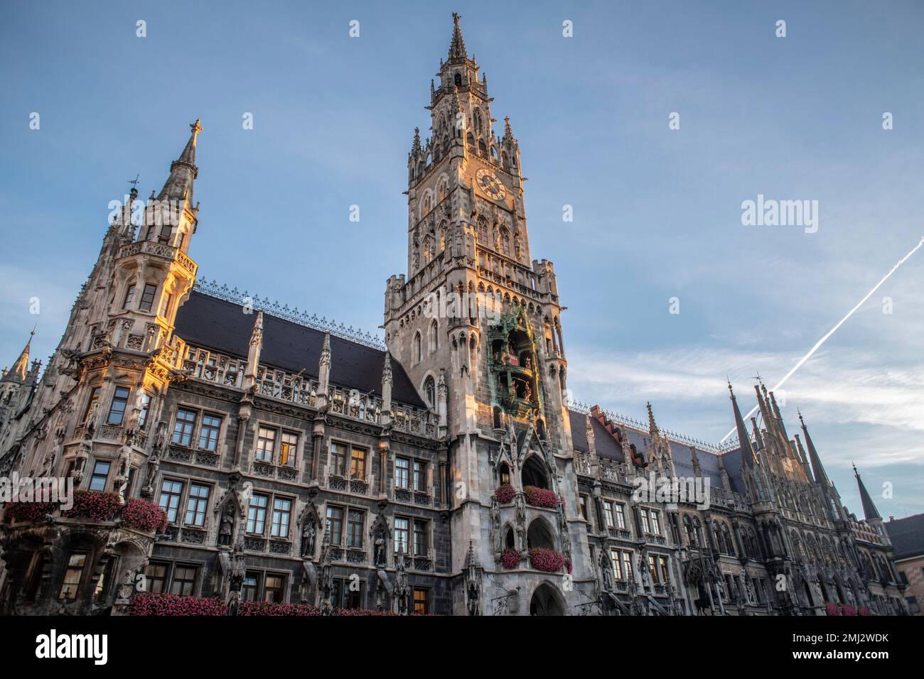 Rathaus a city hall building and its clocktower in the sunlight in ...