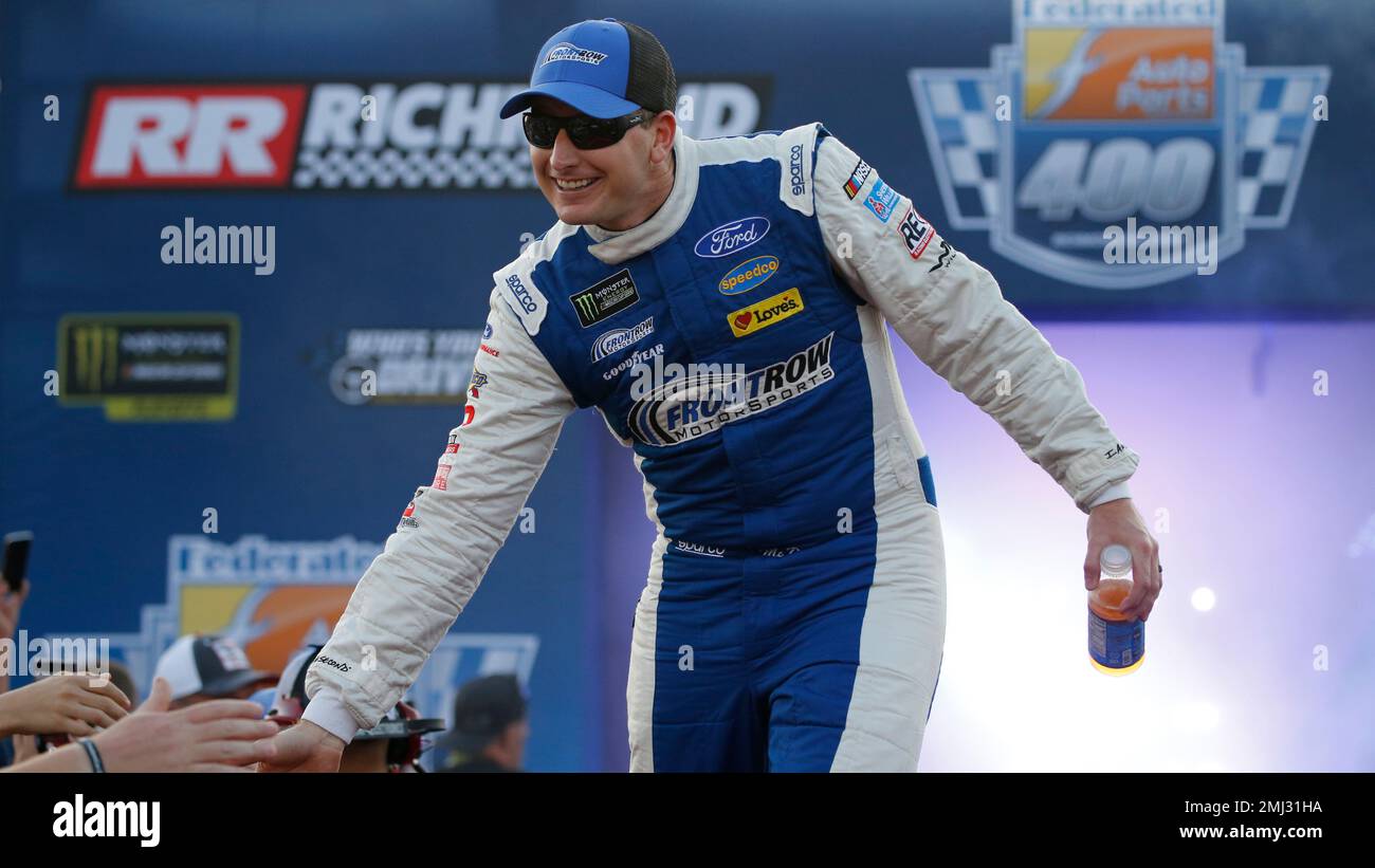 Michael McDowell greets fans during driver introductions for the NASCAR ...
