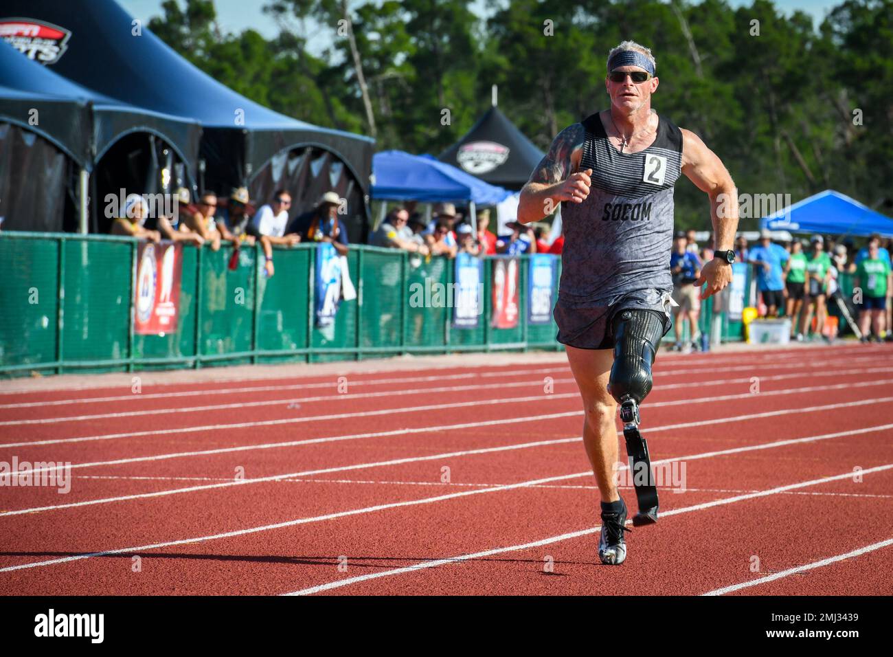U.S. Army Sgt. 1st Class Brant Ireland, Team SOCOM, competes in the 100 ...