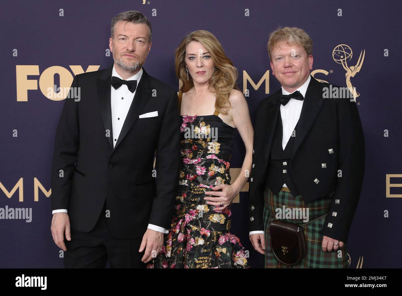 Charlie Brooker, from left, Annabel Jones, and Russell McLean arrive at ...