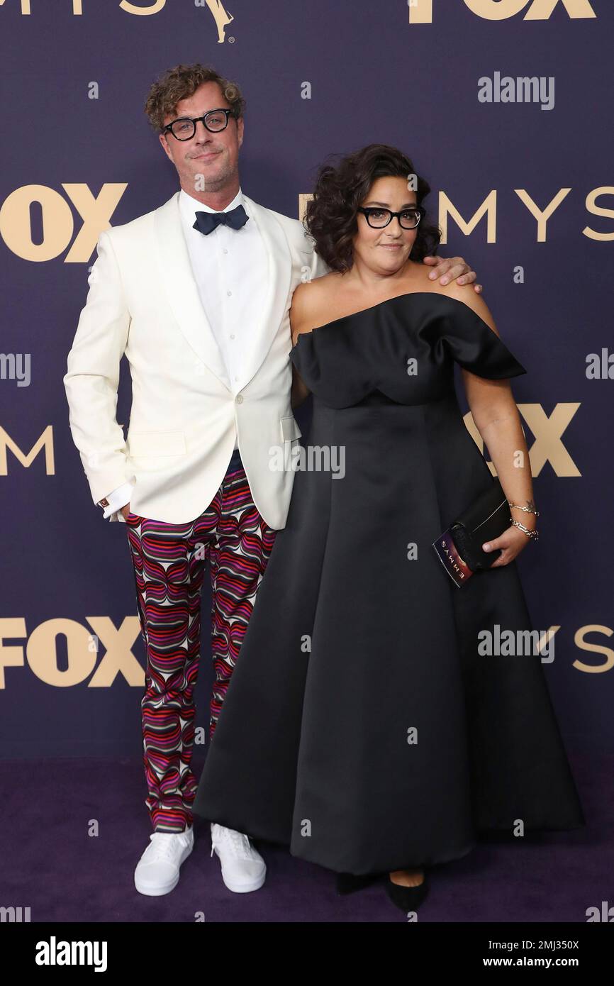Ned Brown, left, and Erica Kay arrive at the 71st Primetime Emmy Awards ...